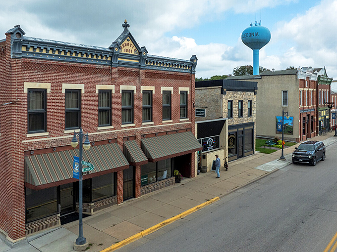 Historic brick buildings frame Caledonia's main street, where small-town economics make retirement dollars work overtime.