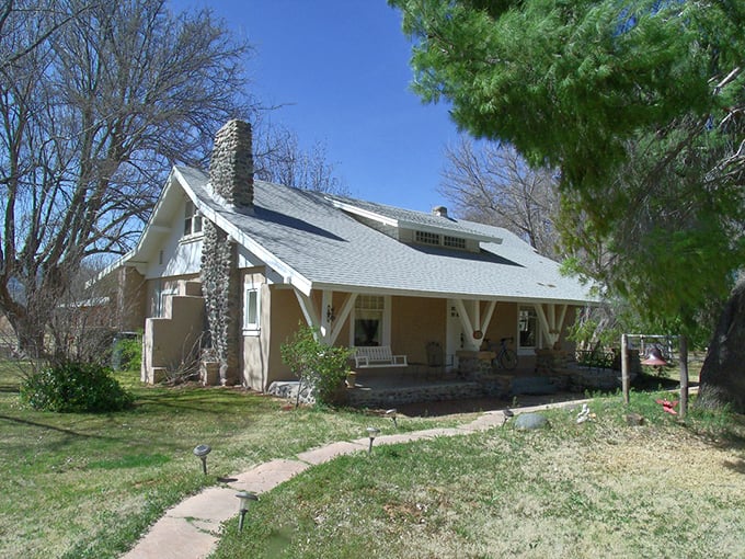 This craftsman bungalow in Camp Verde whispers stories of simpler times. Front porch sitting never went out of style here!