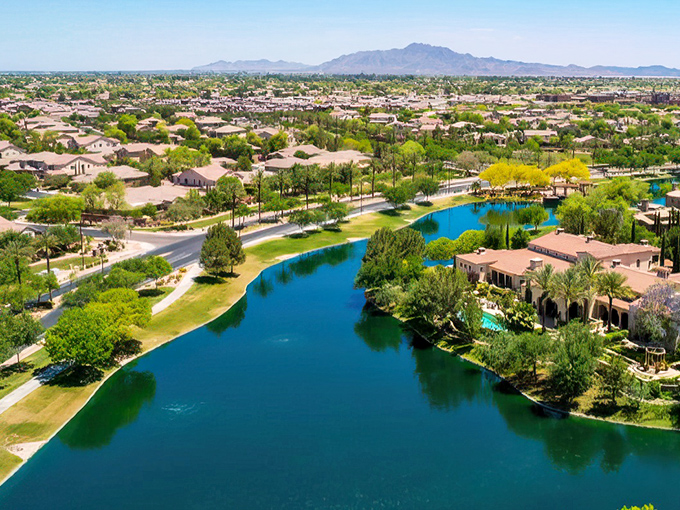 Aerial view of Chandler's masterfully planned waterfront neighborhoods. Desert living gets an upgrade when you add sparkling blue water!