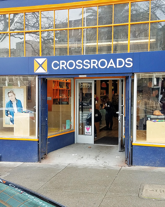 Bright yellow window frames pop against the navy exterior. This isn't just thrifting – it's curated vintage fashion hunting!