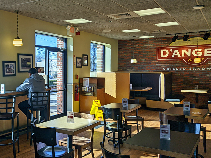 Clean lines and comfortable seating at D'Angelo's &ndash; where your grilled sandwich deserves to be enjoyed slowly.
