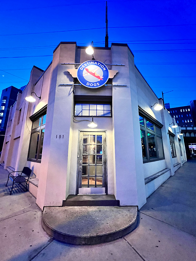 Clean lines and a glowing sign invite you into a world where hot dogs get the gourmet treatment they deserve.