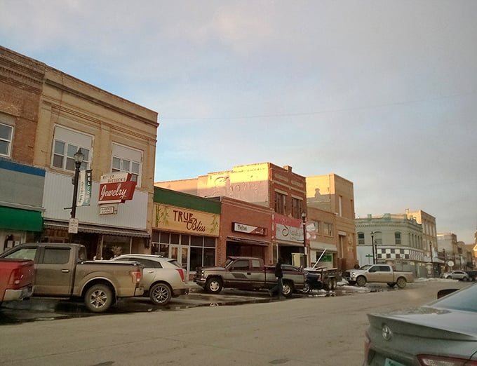 Classic storefronts line streets where your Social Security check still commands real respect.