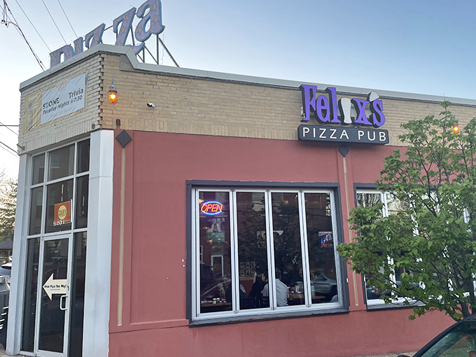The colorful exterior of Felix's Pizza Pub hints at the vibrant flavors waiting inside. That sign has guided many hungry St. Louisans home.