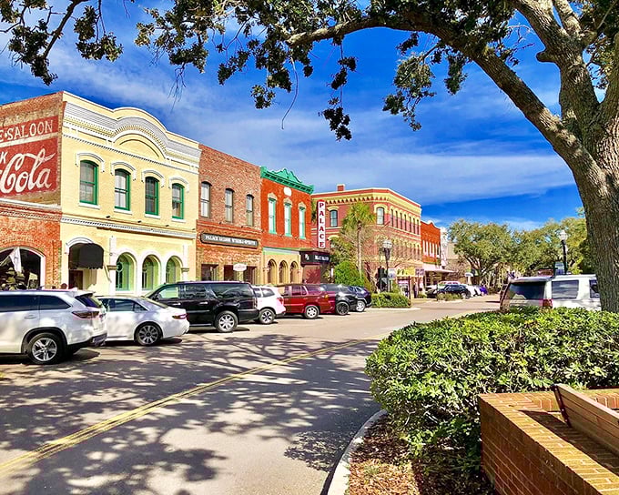 The brick corner building with "Defending Freedom" overhead proves this town honors history while staying welcoming and vibrant.