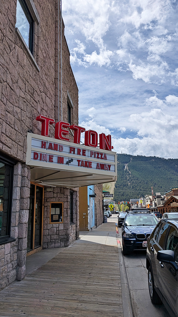 The marquee might not advertise movies anymore, but it's still showcasing stars - pizza stars, that is!