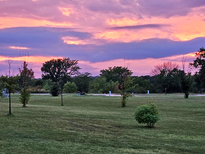 Purple skies and peaceful meadows at Hillsdale. Kansas sunsets putting on a show that beats anything on Netflix.