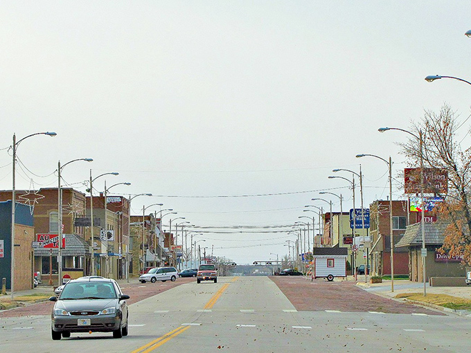 The classic American main street in Hoisington promises the kind of neighborly retirement where your budget breathes easier and your porch always has visitors.