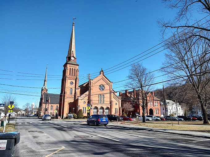 A church spire rises above Honesdale's skyline, while American flags flutter along streets that tell the story of early American industry.