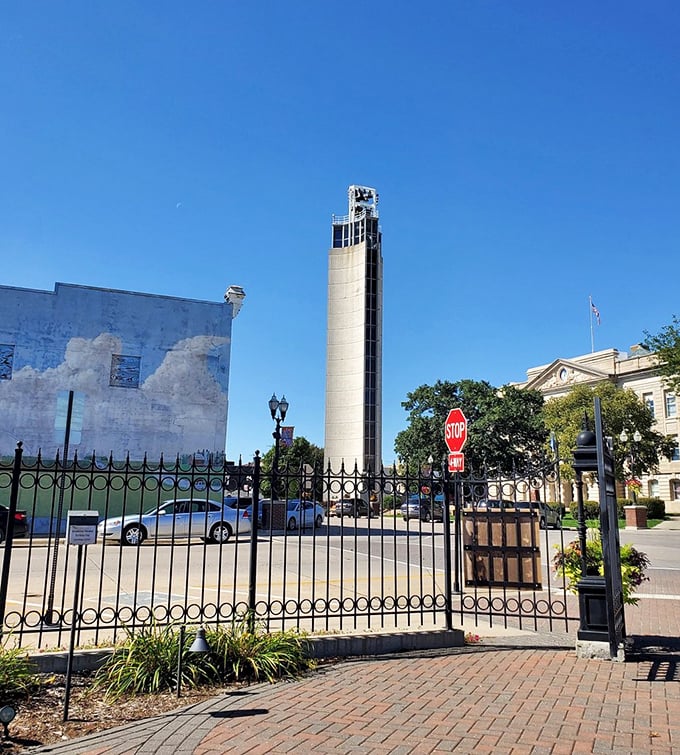 Behind ornate gates, Jefferson's carillon tower stands ready to serenade the town with melodies that float across prairie breezes.