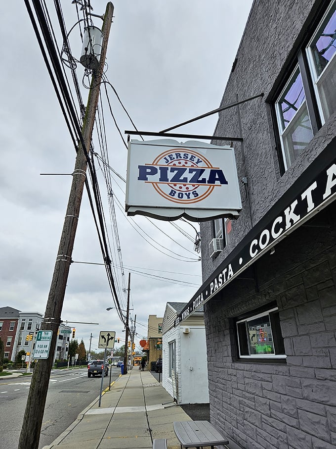 That modest exterior conceals some seriously impressive New Jersey-style pizza craftsmanship and passion within.