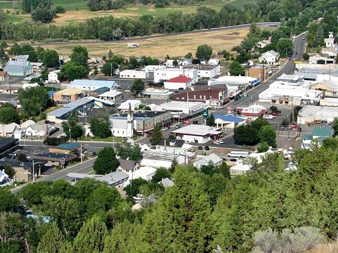 John Day's main street offers that perfect blend of frontier charm and small-town practicality beneath endless blue skies.