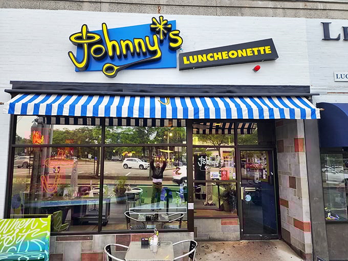 The bright blue and yellow signage of Johnny's Luncheonette promises a retro diner experience that's stood the test of time in Newton.