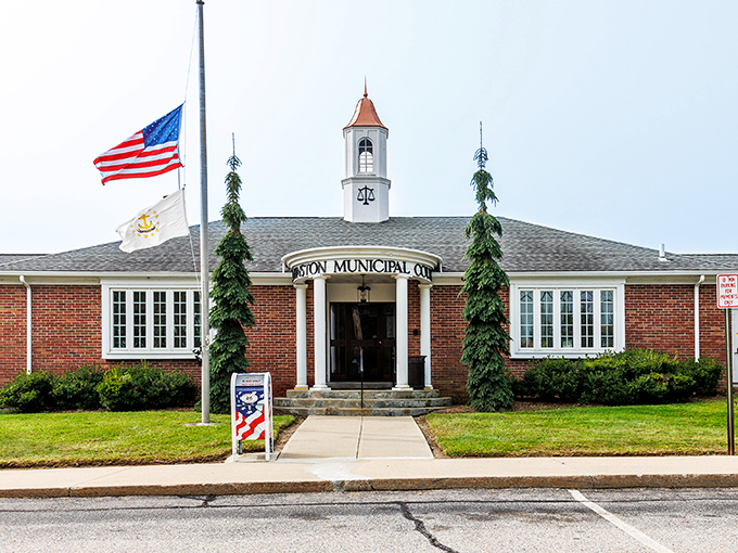 Johnston&rsquo;s municipal court, standing proudly beside the American flag, embodies a community where your fixed income stretches comfortably and confidently.