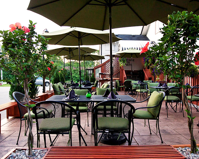 Kurt's outdoor patio is where summer memories are made. Those green cushions have cradled many happy diners between bites of filet.