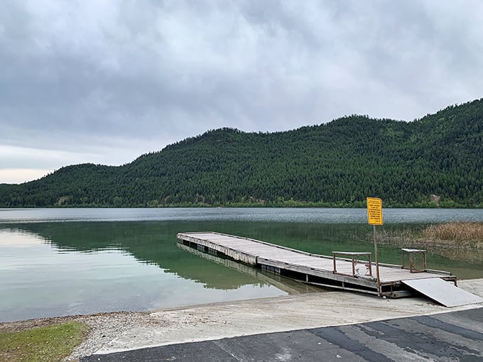 The dock extends an invitation to jump in. Logan State Park's peaceful waters reflect the sky like a mirror on this perfect Montana day.