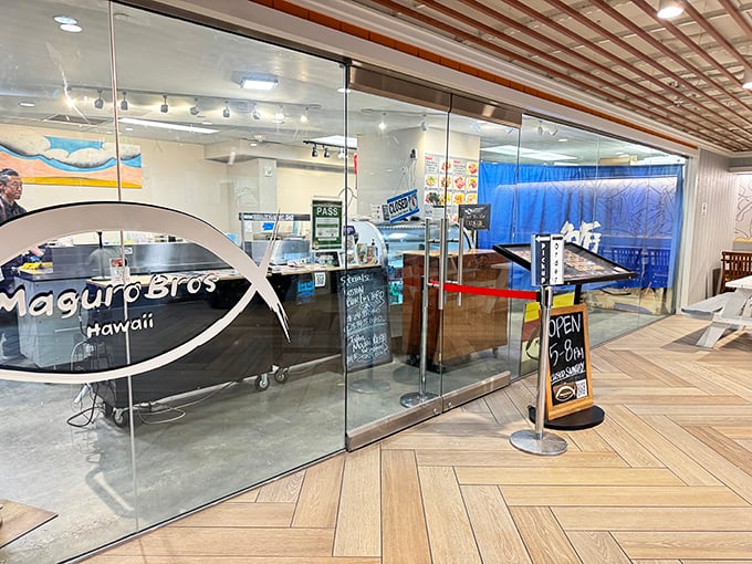 The clean, modern interior of Maguro Brothers is the stage where sushi-grade fish becomes the star of your poke bowl.