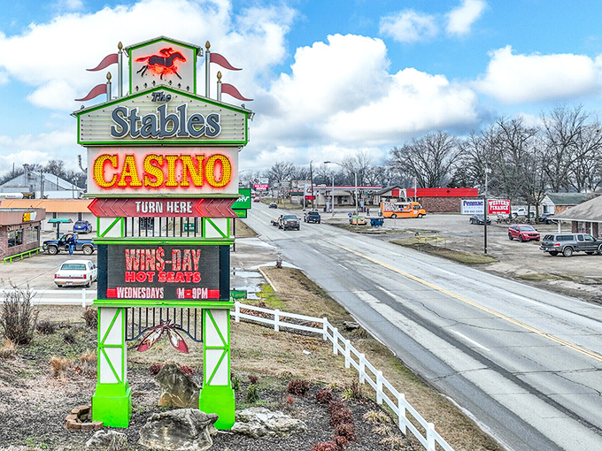 A vibrant neon sign for The Stables Casino brightens the roadside in Miami, where gaming fun and small-town hospitality create an unexpected Oklahoma pairing.