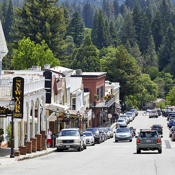 Nevada City's historic downtown looks like a Gold Rush film set, where modern shoppers stroll past buildings with 19th-century stories.