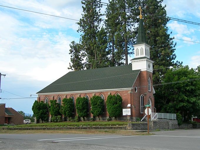 Rathdrum's historic brick church stands as a testament to small-town values. Sunday services come with a side of affordable living and genuine community.