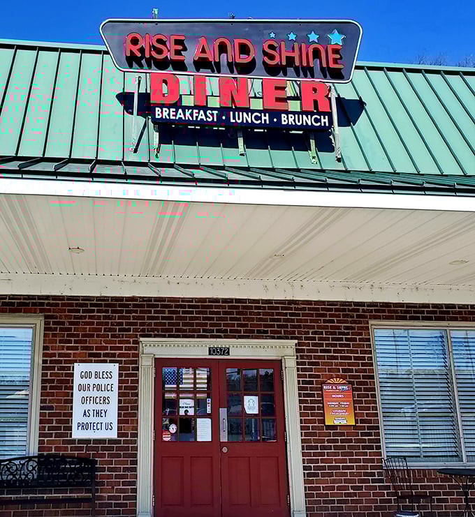 That bright neon sign promises breakfast, lunch, and brunch—because limiting good food to certain hours makes no sense whatsoever.