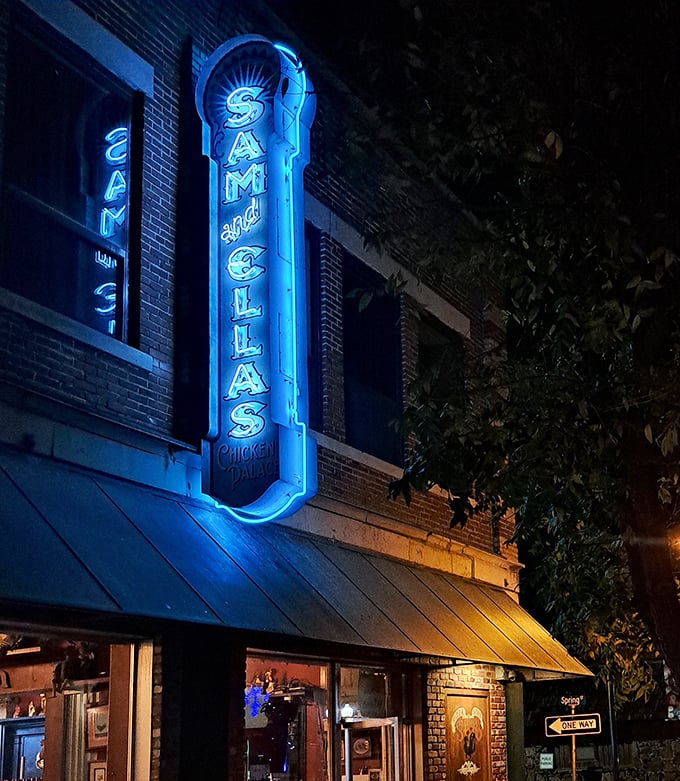 Blue neon lights up the night at Sam & Ella's Chicken Palace. Who knew a chicken joint would hide such spectacular pizza?