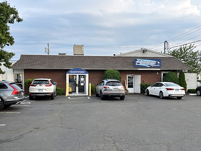 Wooden benches, fresh air, and lobster to write home about &ndash; the Sandpiper's outdoor seating area is summer in Connecticut distilled.