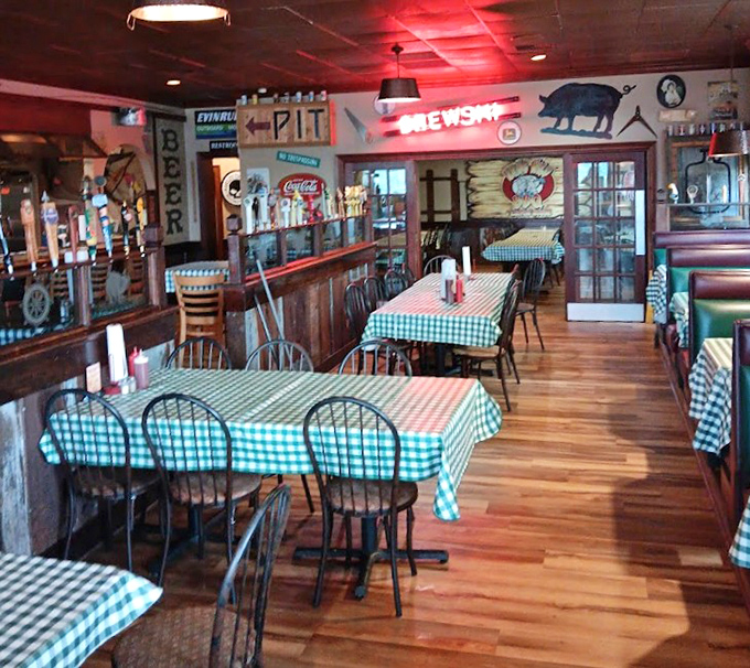 Checkered tablecloths and BBQ memorabilia create the perfect setting for ribs that fall off the bone with theatrical flair.