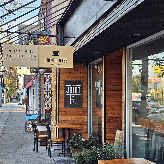 This minimalist spot transforms from morning coffee haven to seafood paradise faster than Clark Kent in a phone booth.