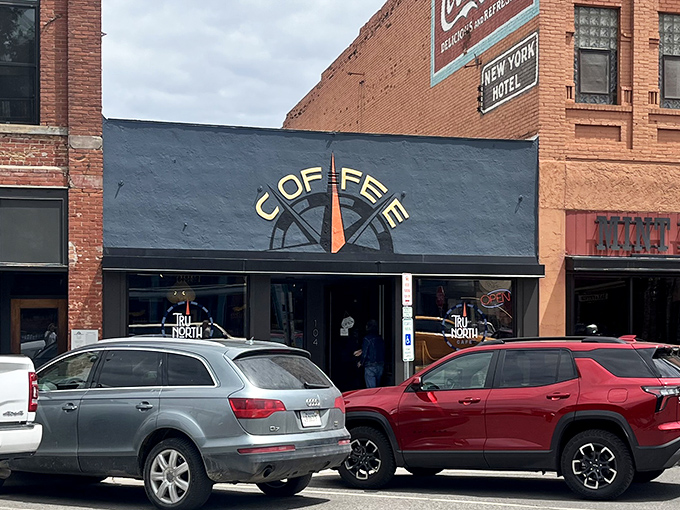 The classic blue storefront with its compass logo stands ready to guide hungry explorers to breakfast nirvana.