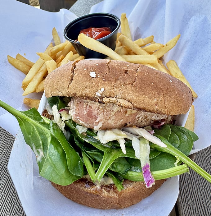 An ahi burger that brings together the best of land and sea. Fresh spinach and slaw add crunch to every satisfying bite.