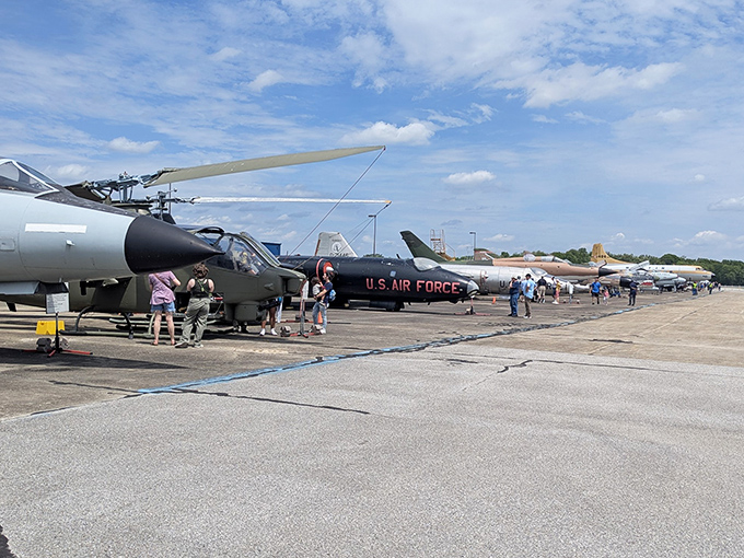 Open cockpit day at the museum draws aviation enthusiasts like bees to nectar, each hoping to capture a taste of flight history. 