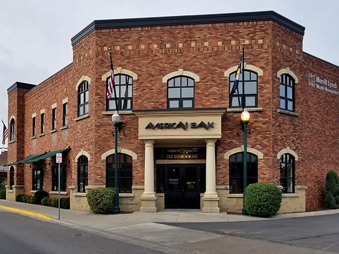 American Bank's brick façade adds a touch of historic gravitas to downtown, balancing preservation with the practical needs of a thriving mountain community.