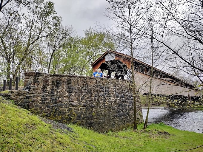Stone foundations anchor history to the present. This masterpiece of 19th-century engineering still stands strong against Pennsylvania's seasonal mood swings.