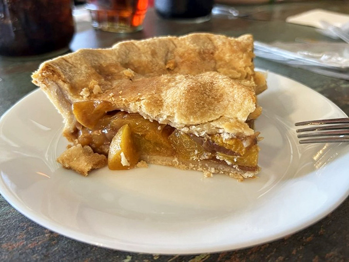 Apple pie so perfectly golden and flaky, it makes you wonder if they've hired pastry wizards who studied at Hogwarts' culinary department.