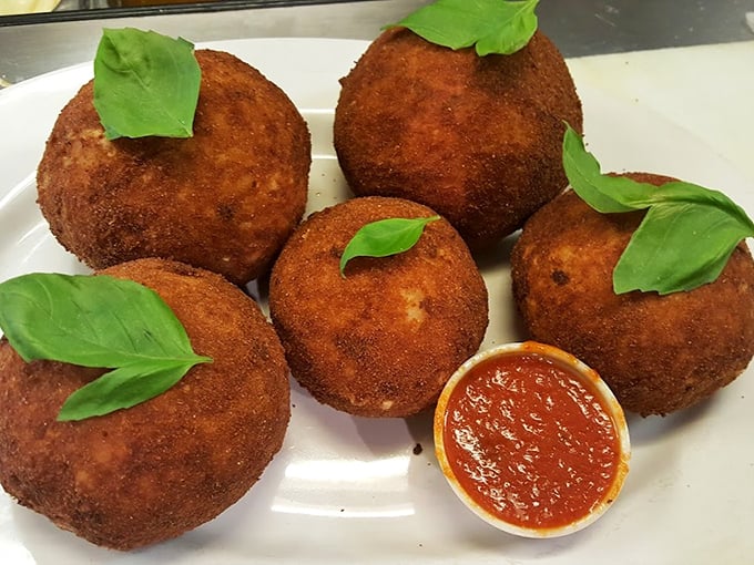These arancini balls are the Italian answer to "Can we make rice even better?" Spoiler alert: Yes, by frying it with cheese inside.