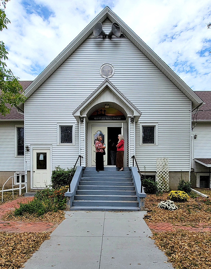 Small-town faith endures at the white clapboard church, where community connections are forged through shared beliefs and potluck suppers.
