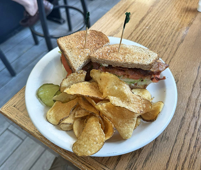 A classic BLT with house-made chips&mdash;sometimes the simplest pleasures are the most profound culinary statements.