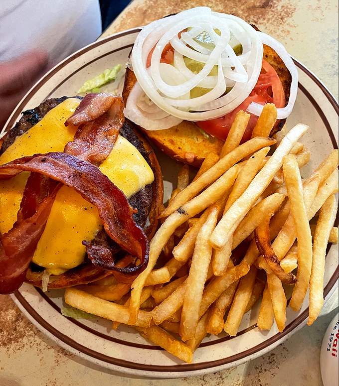 A burger that doesn't need fancy aioli or artisanal buns to be magnificent &ndash; just good beef, melty cheese, and crispy bacon.