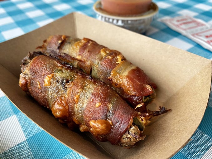 These aren't your average jalape&ntilde;o poppers from the freezer section&mdash;they're bacon-wrapped flavor bombs that might make you forget your name temporarily.