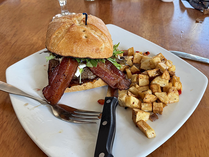 A bacon cheeseburger that understands the assignment: juicy patty, crispy bacon, and perfectly toasted bun unite gloriously.