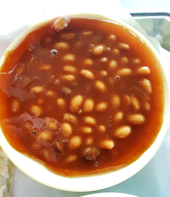 These aren't your sad canned baked beans. They've clearly been introduced to some smoky friends and had a life-changing experience.