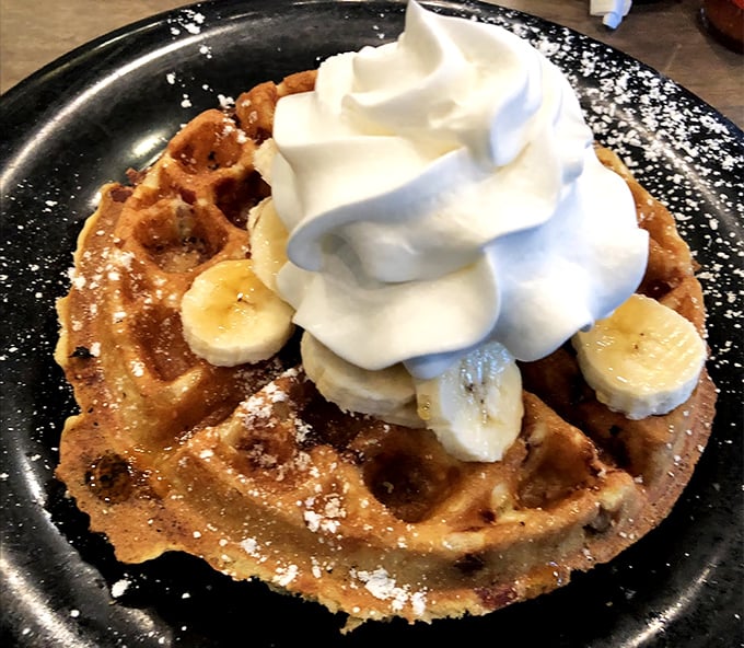 A waffle wearing its Sunday best&mdash;dressed up with fresh bananas and a cloud of whipped cream that's practically begging to be photographed.