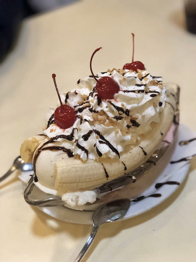 The banana split – where fruit technically makes it health food, and those cherries definitely count toward your daily servings.