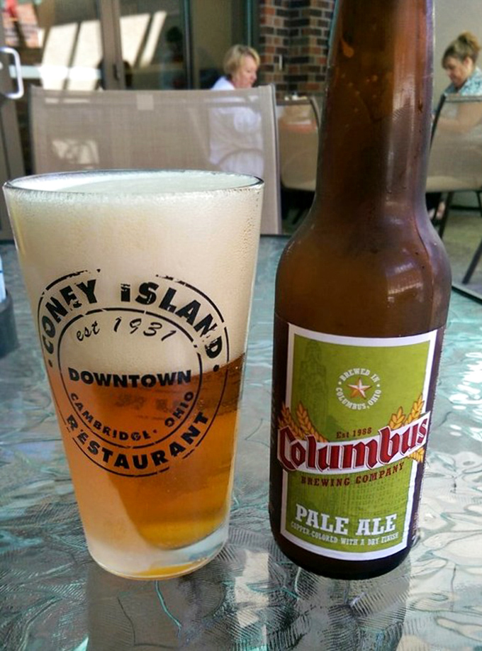 Local craft beer served in a glass proudly displaying the restaurant's heritage. Some pairings are just meant to be.