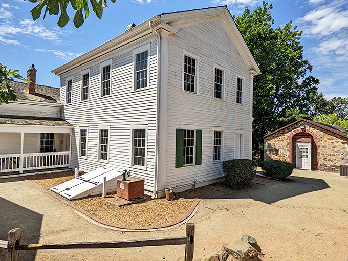 The Bernhard Museum's white clapboard elegance whispers stories of pioneer days when Amazon Prime definitely wasn't a thing.