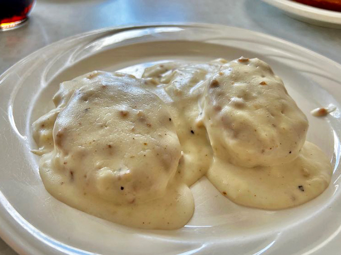 These biscuits haven't just been smothered in gravy &ndash; they've been embraced by it, creating breakfast's most comforting love story.