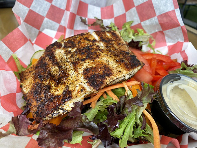 Blackened fish that proves simplicity is the ultimate sophistication. That perfect char is the culinary equivalent of a perfect sunset &ndash; breathtaking.