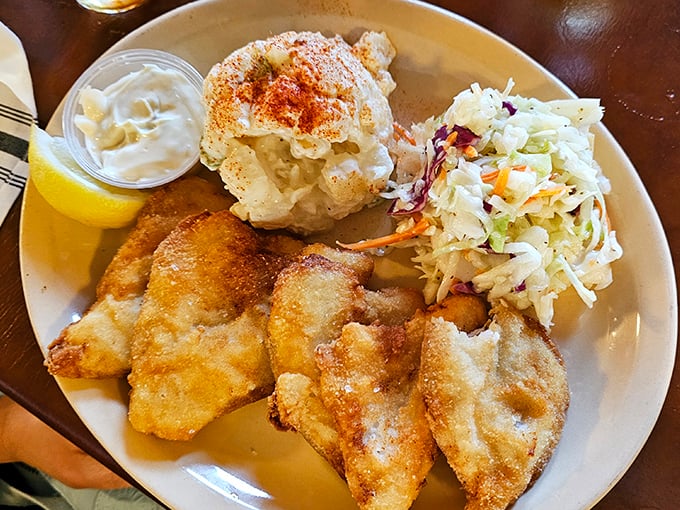 The bluegill dinner proves Fisher's isn't a one-fish wonder. That crispy coating deserves its own fan club.