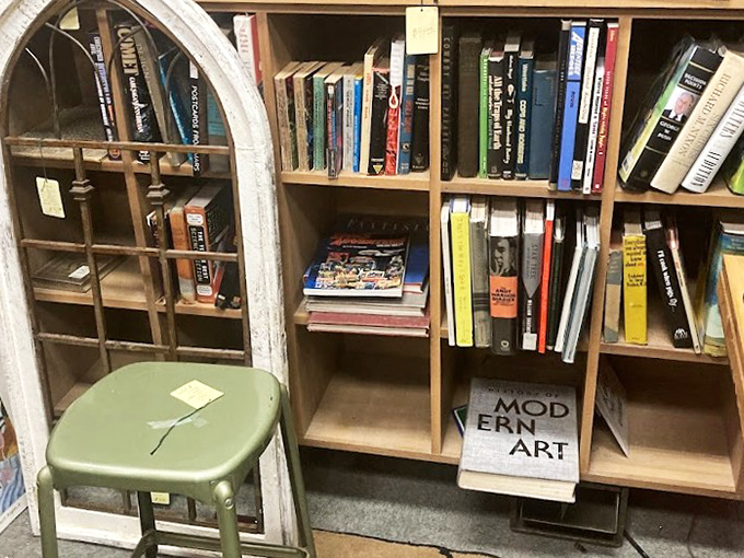 The book corner offers literary escapes at pocket-change prices. That green stool? Perfect for test-driving your potential next read.